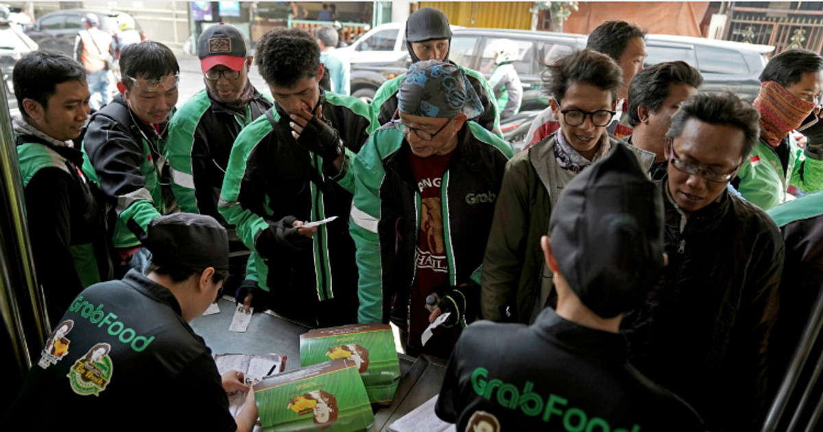 Thế giằng co của Gojek và Grab trên thị trường giao đồ ăn